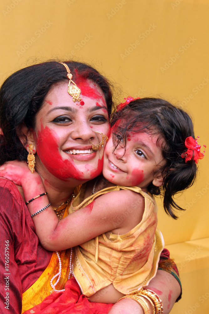 Beautiful bengali woman is playing Sindur with her daughter, Calcutta ...