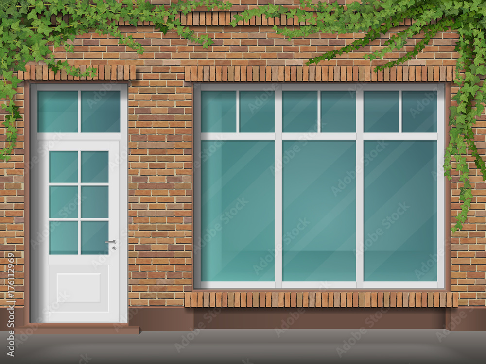 Store front with large transparent window. Facade of red brick. Empty ...