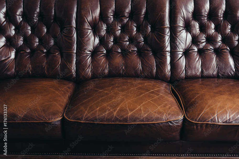 Old run down leather sofa close up Stock Photo | Adobe Stock