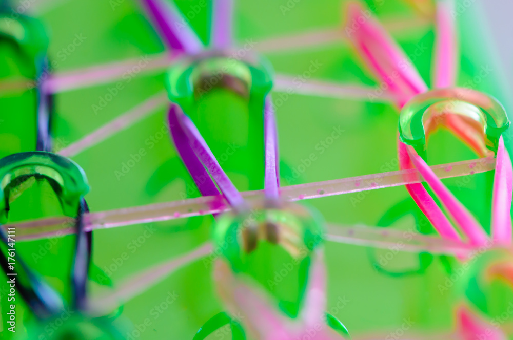 Making loom band friendship bracelets using a loom band frame Stock ...