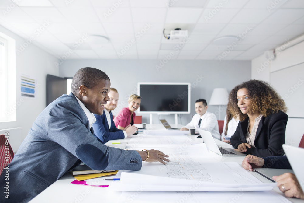 Team of architects and project managers working in office ภาพถ่ายสต็อก ...