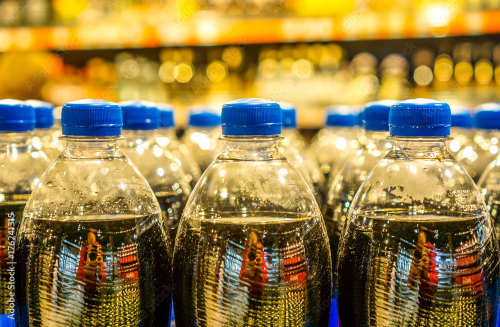 Many bottles with pepsi top view. background made by big pepsi bottles ...