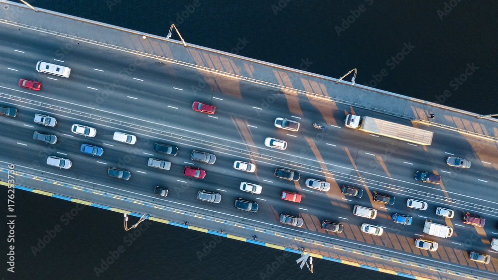 Aerial top view of bridge road automobile traffic jam of many cars from ...