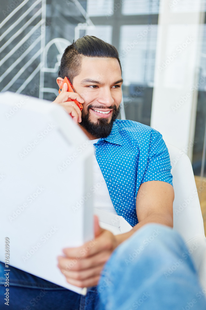 Young student making a call Stock Photo | Adobe Stock