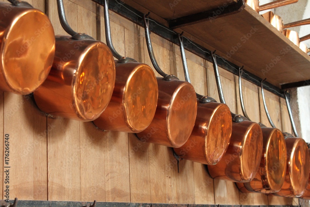 Vintage copper pans ready for cooking Stock Photo | Adobe Stock