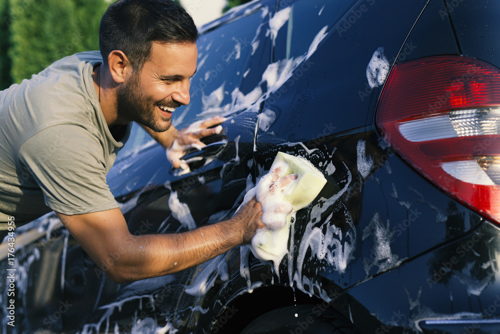 Man washing car Stock Photo | Adobe Stock