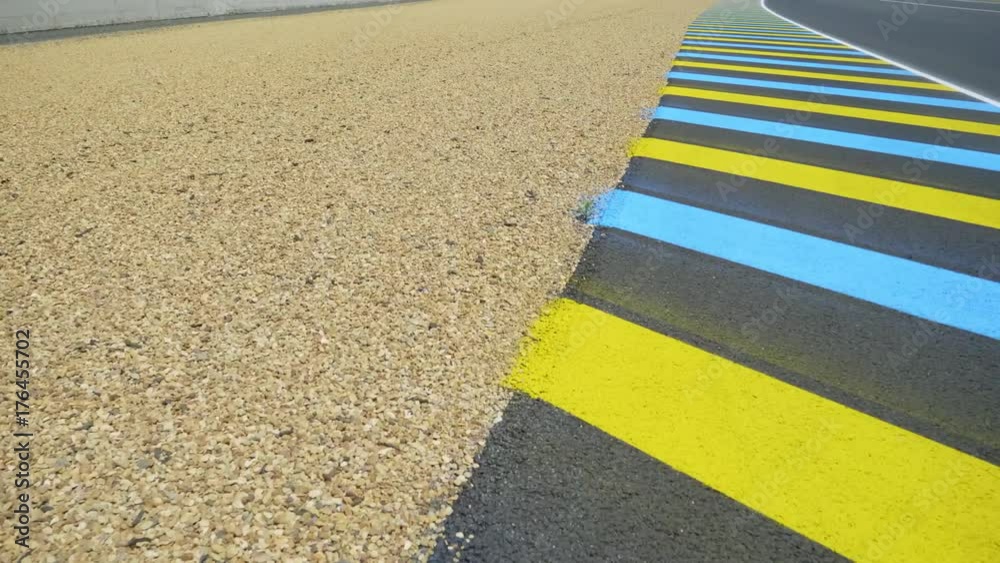 Closeup of asphalt highway with road markings, white and colorful solid ...