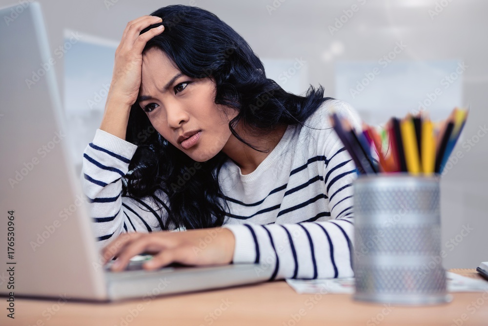 Composite image of concentrated asian woman with hand on head Stock ...