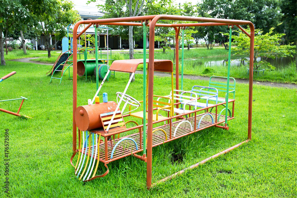 Swing train at the playground.Swing metal train at playground with ...