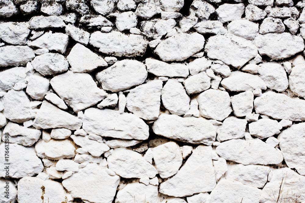 sfondo muro in pietre dipinte di bianco.isola greca. Stock Photo ...