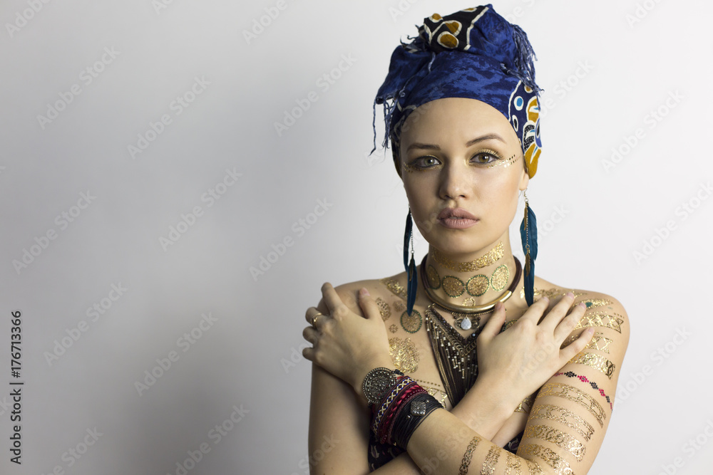 Oriental girl in African clothes Arab girl in an African style dress ...