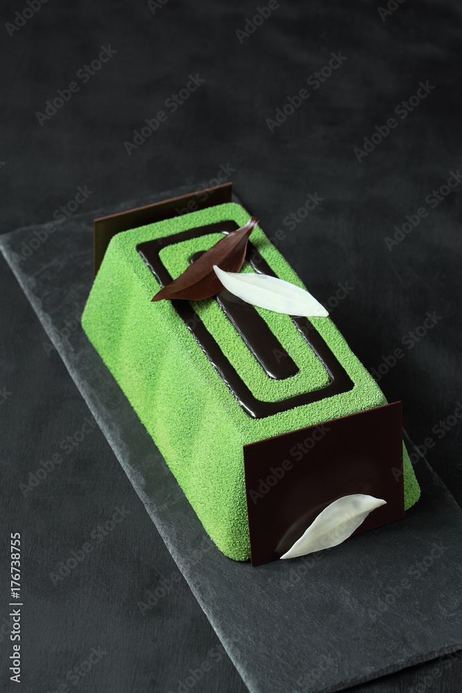 Contemporary Green Tea Mousse Cake covered with green velvet and ...