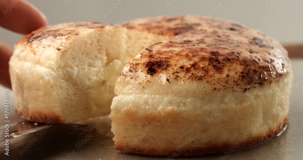 round cake cutted and taking off first slide off Stock Photo | Adobe Stock