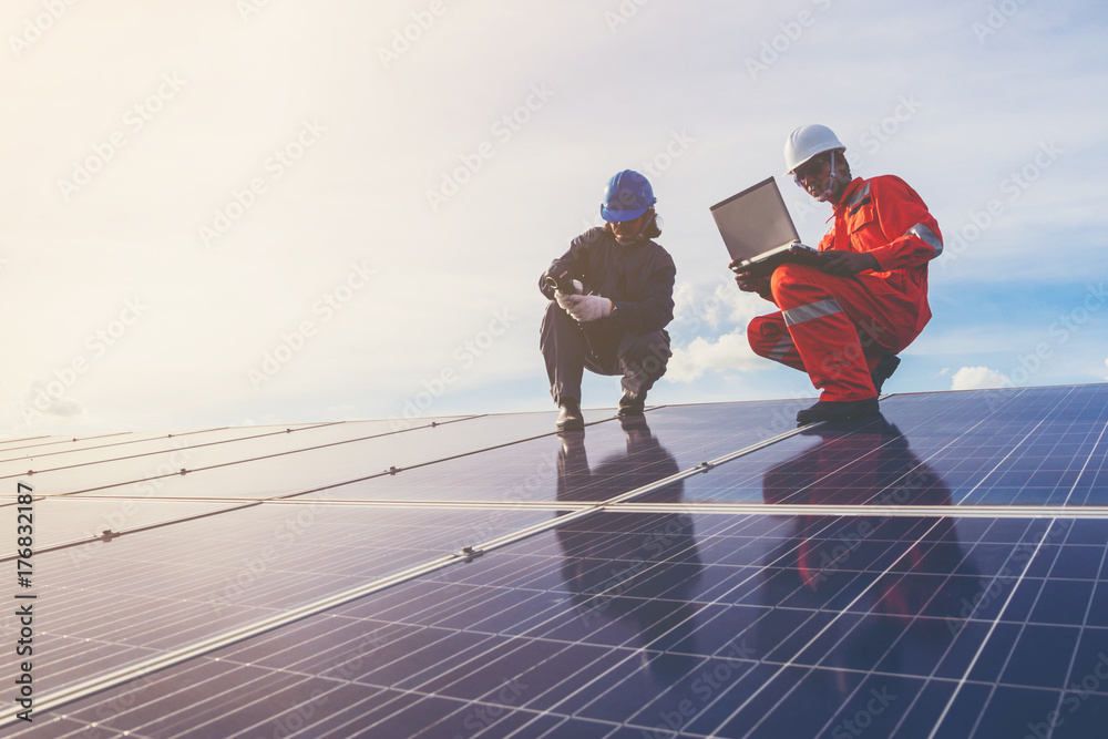 operation and maintenance in solar power plant ; engineer working on ...