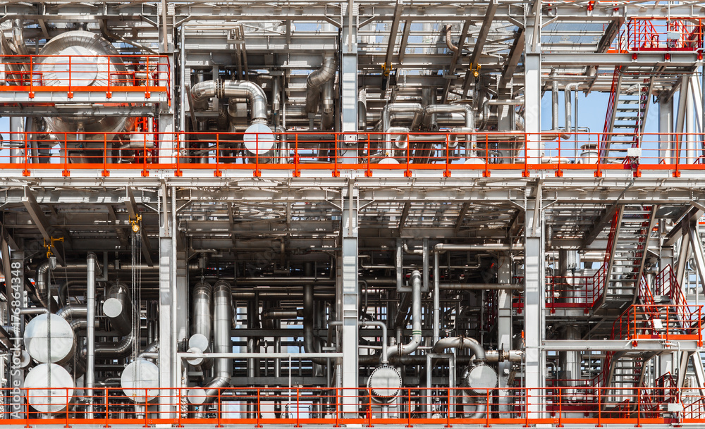 Modern oil / chemical factory structure with pipes,construction,tubes ...