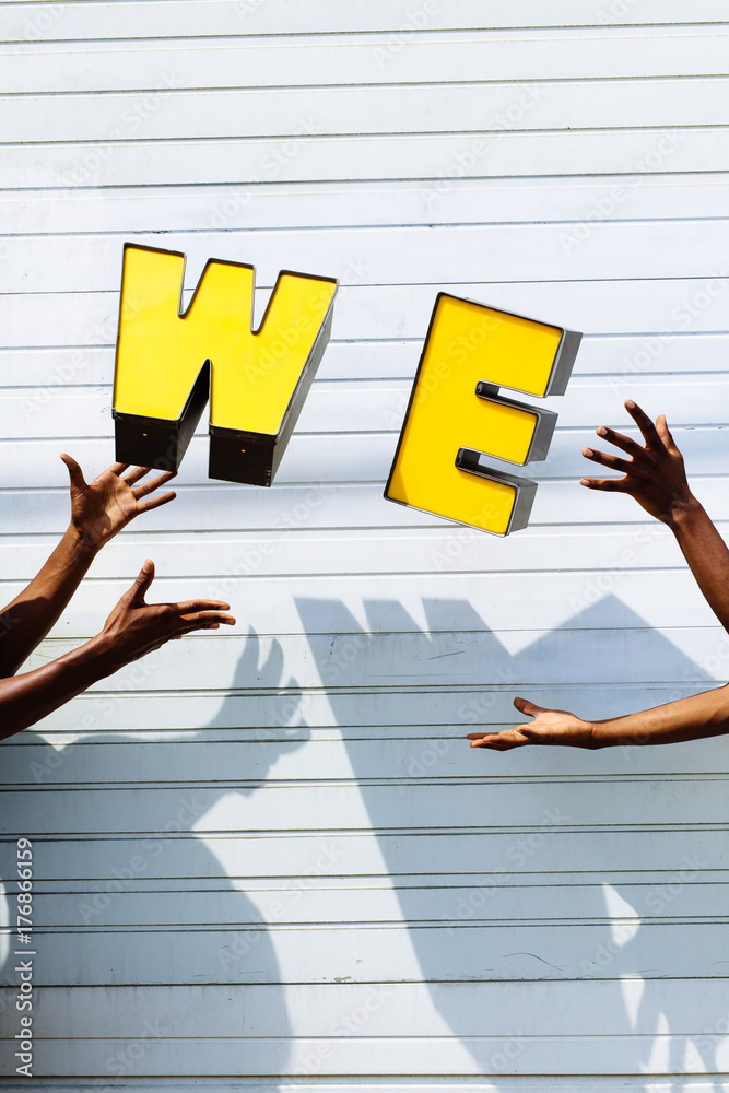 Hands with the word WE Stock Photo | Adobe Stock