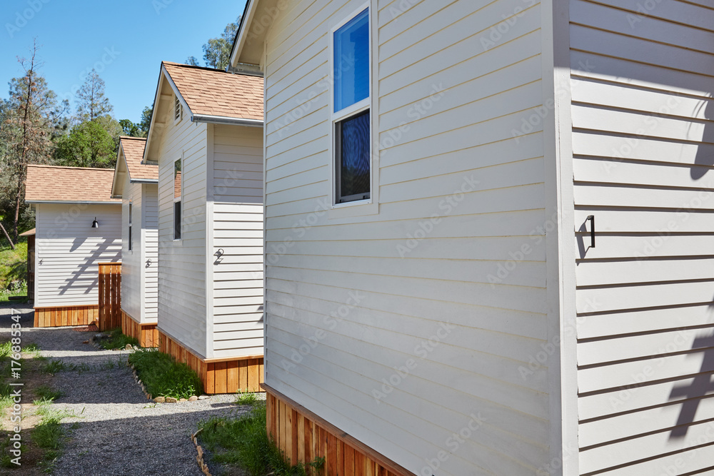 Group of tiny houses on lot Stock Photo | Adobe Stock