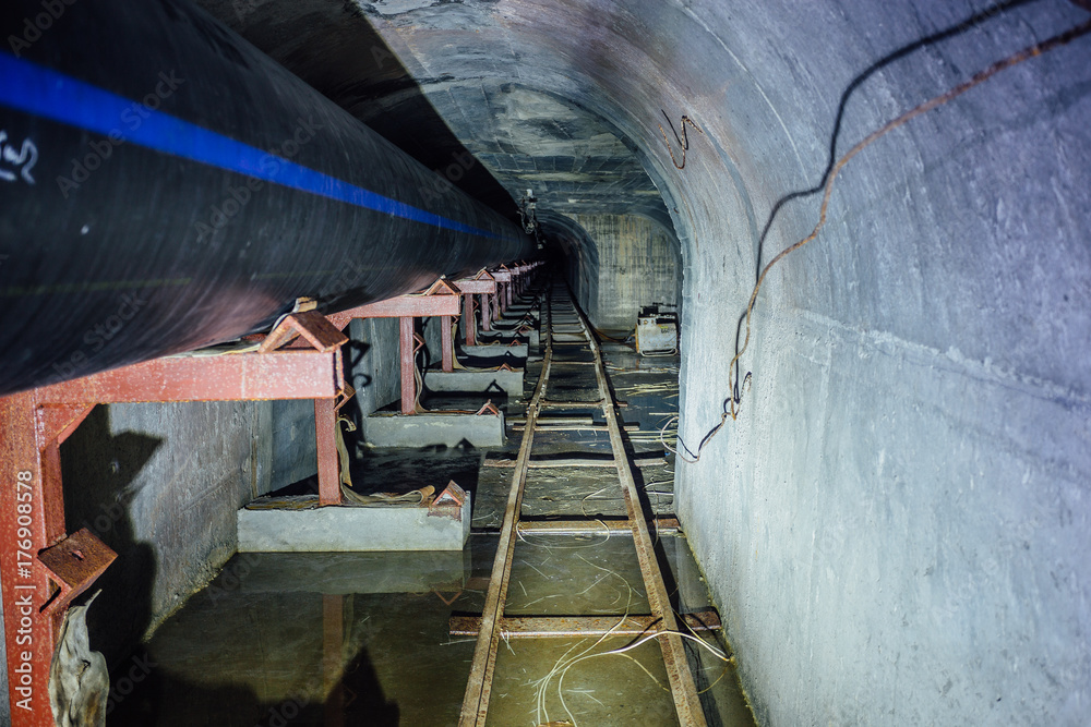 Construction of sewer pipeline from plastic pipes in sewer tunnel with ...