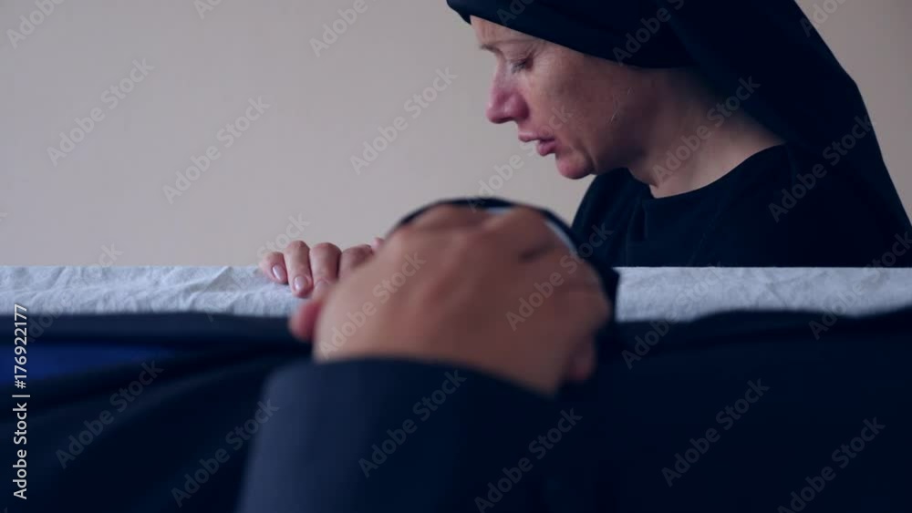 funeral, sadness and mourning concept - sad woman talking and crying ...