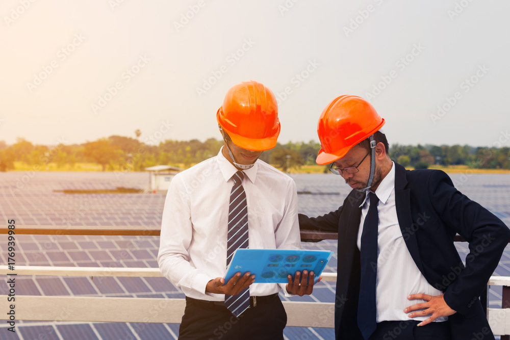 engineering team working on checking and maintenance equipment at solar ...