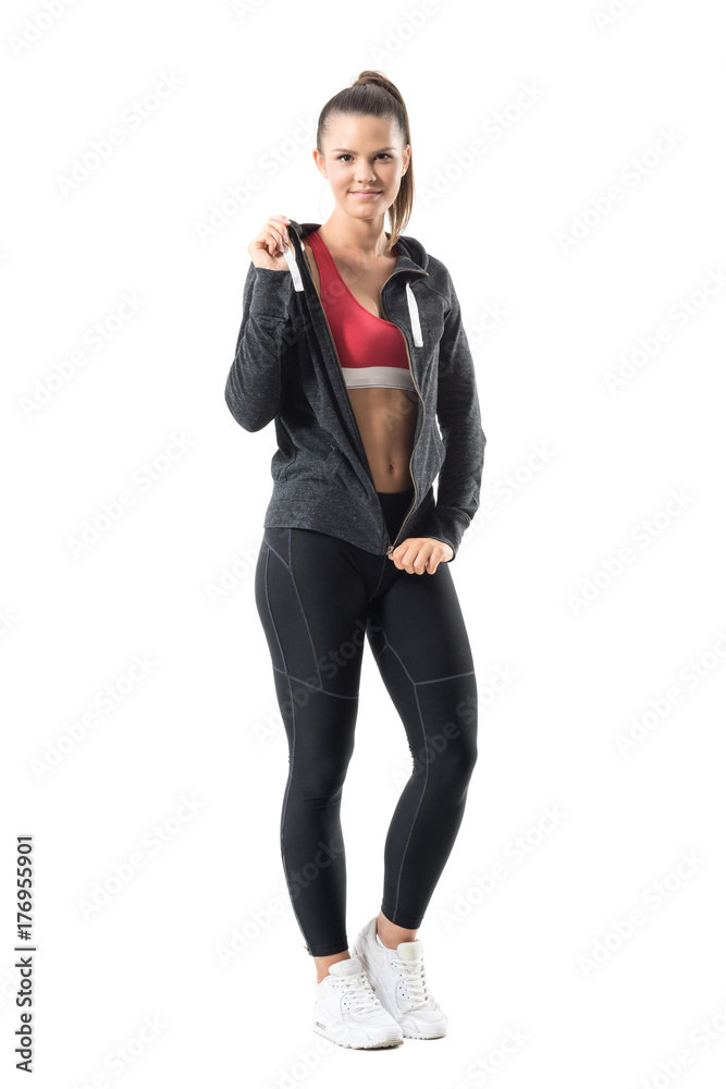 Gorgeous attractive fit jogger taking off zip up hoodie sweatshirt ...
