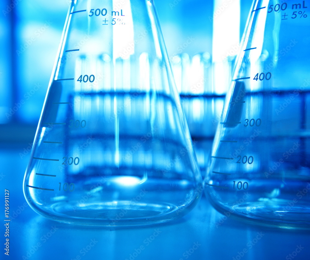 blue part of glass flask in technology science laboratory background ...