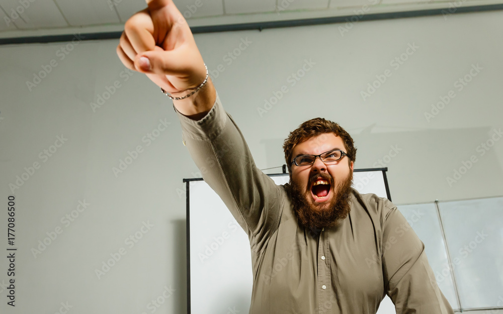 Angry bearded man pointing his finger against somebody. human emotion ...
