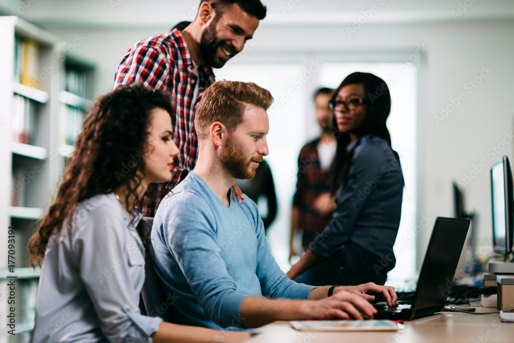 Portrait of programmers working in development software company Stock ...