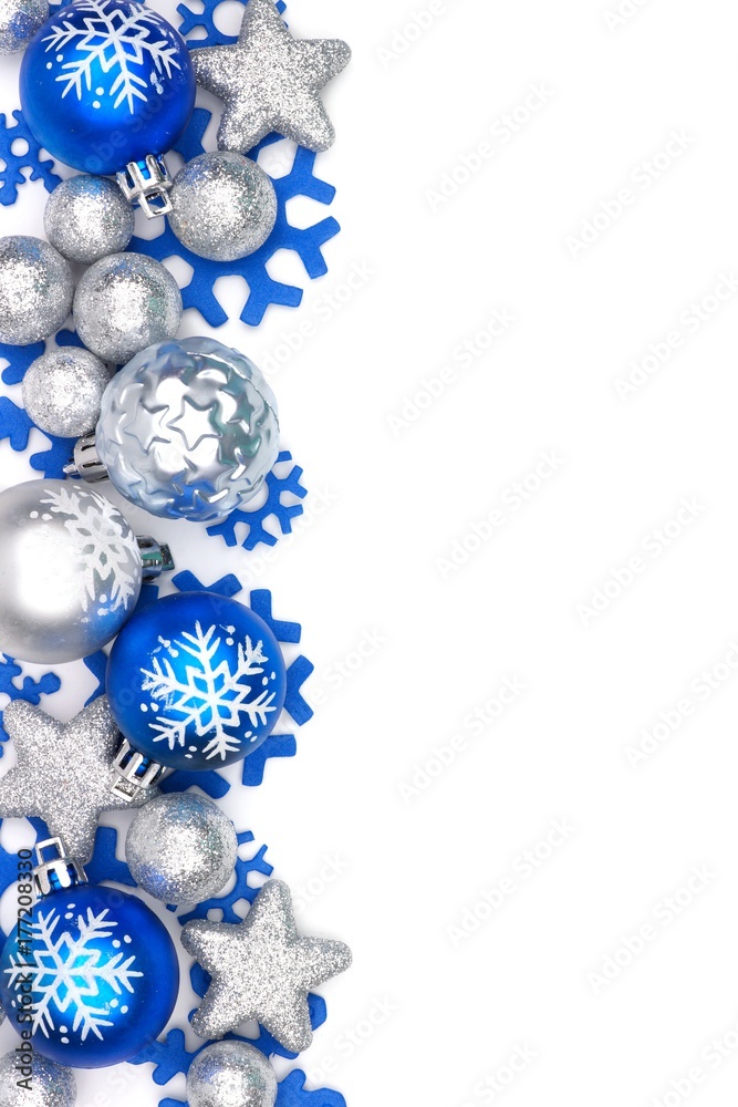 Christmas border of blue and silver ornaments isolated on a white ...