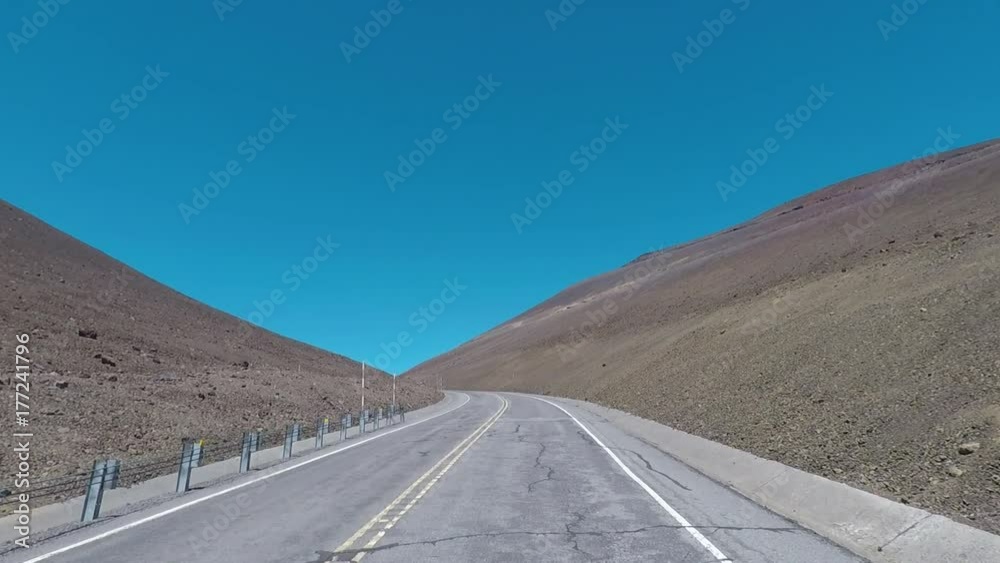 Driving volcano road to Mauna Kea Observatory POV Hawaiii. Most active ...