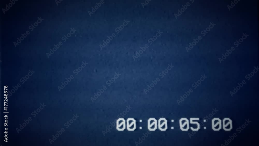 Vidéo Stock A very badly damaged VHS tape playing. Blue screen with ...