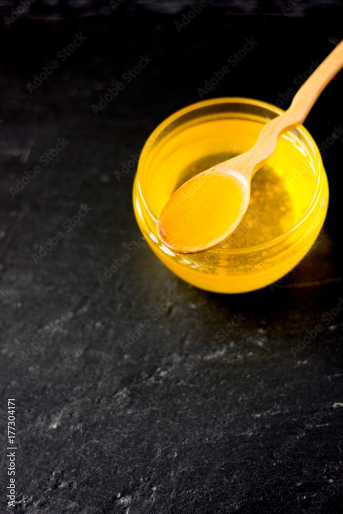Indian ghee in a transparent glass bowl. Stock Photo | Adobe Stock