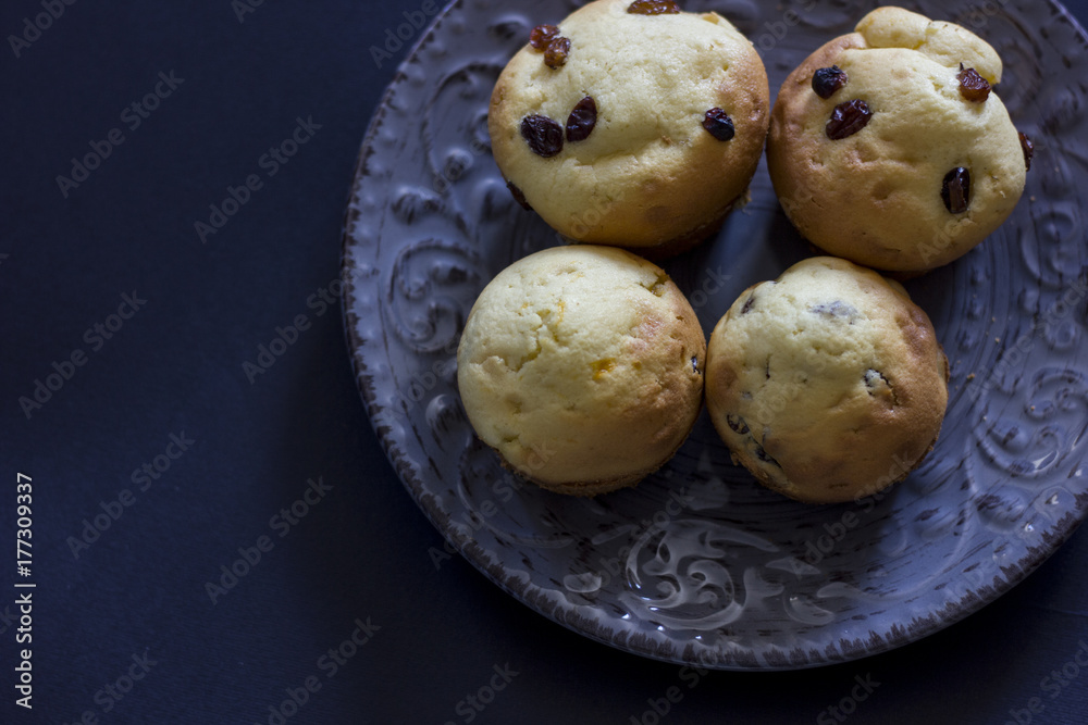Tasty vanilla muffins on an ornamented plate Stock Photo | Adobe Stock