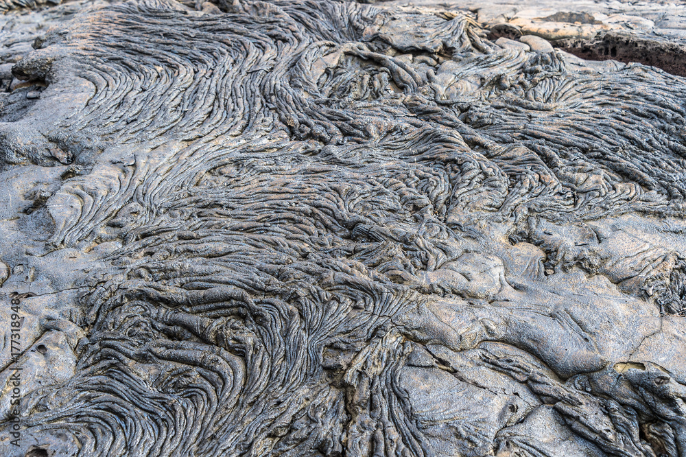 Pahoehoe or rope lava, on Rabida Island, Galapagos. It is formed of ...