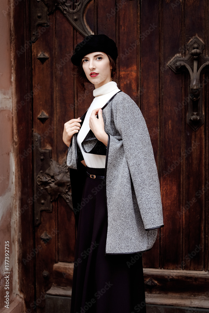 Retro styled portrait. Teacher woman in old fashioned classic outfit ...