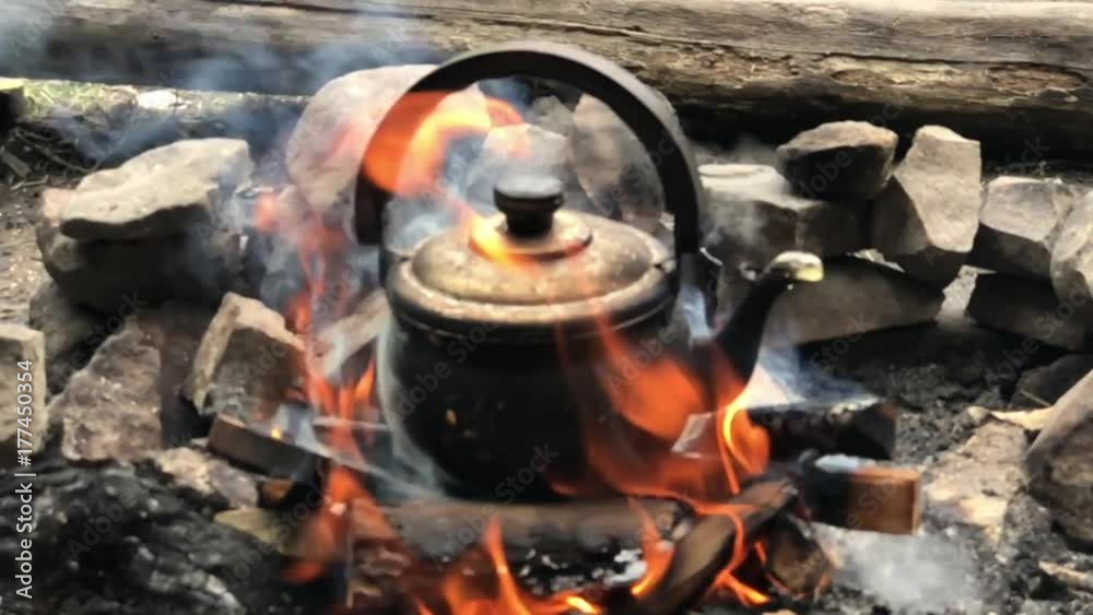 Slow motion: Boiling kettle fire steam Camping Kettle Burning Fire ...