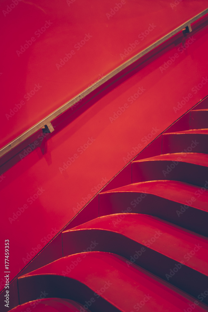 Red stairs and handrail in modern building interior Stock Photo | Adobe ...