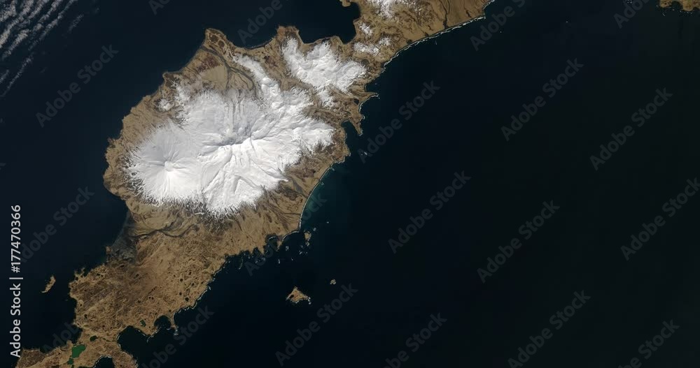 Very high-altitude overflight aerial of Unmak Island, the Aleutian ...