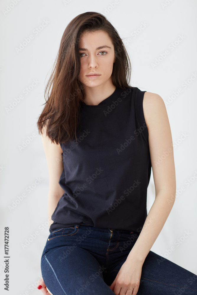 young female posing on model test photo shoot with natural day light ...