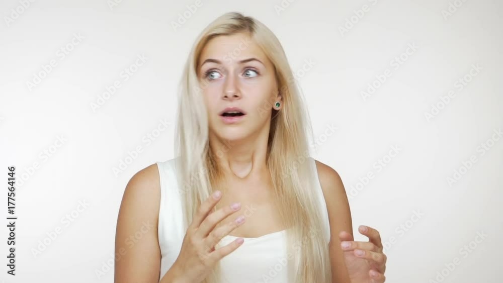 slomo portrait of caucasian young woman looking from side to side ...
