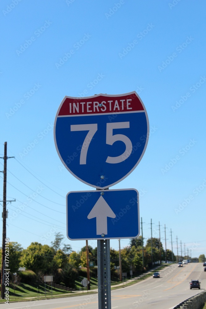 The red white and blue interstate sign. Stock Photo | Adobe Stock