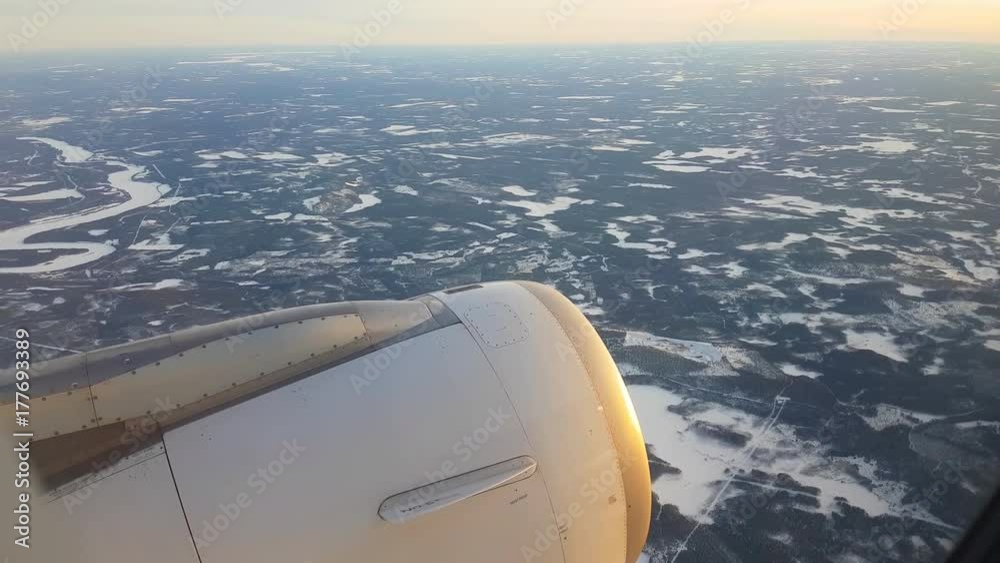 AERIAL: Airplane flying above gorgeous frozen wetland landscape in ...