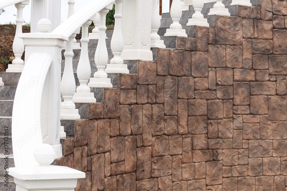 Steps (stairs) with white columns. The row of classical columns with ...