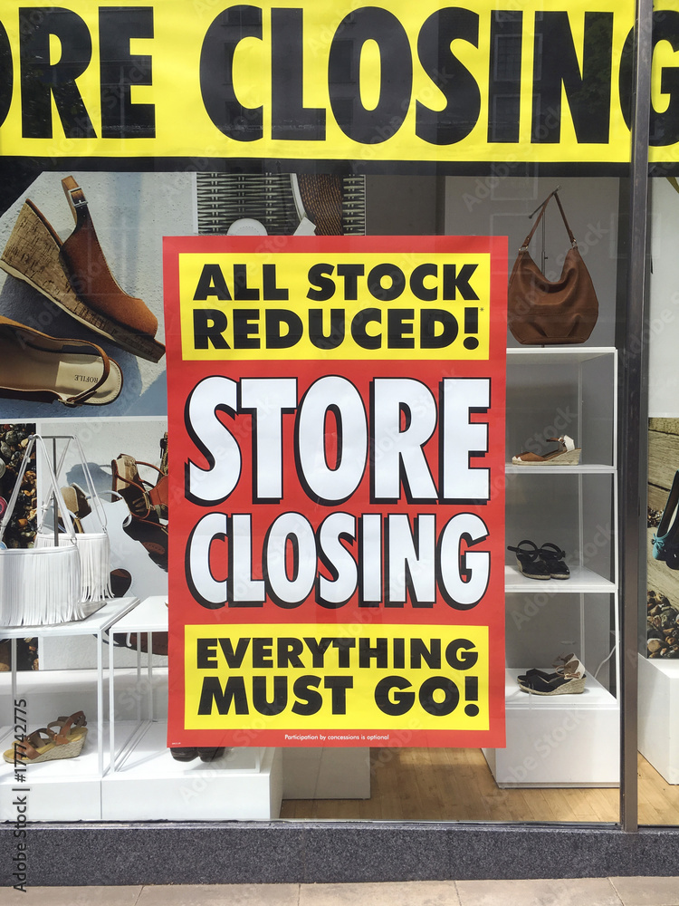 Closing Down Sign in a shop window in vertical format Stock Photo ...