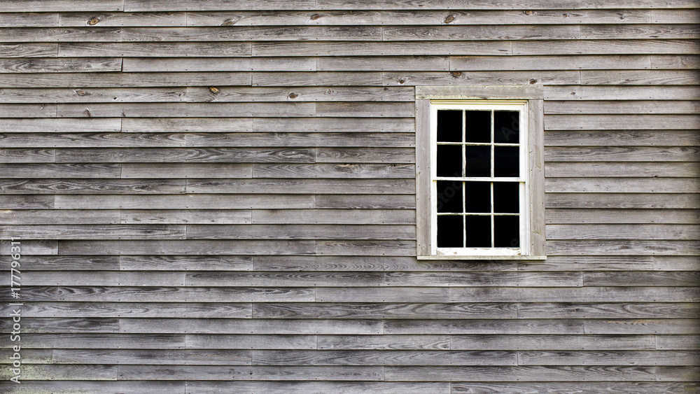 background of a rustic exterior wall of wooden planks and a window ...
