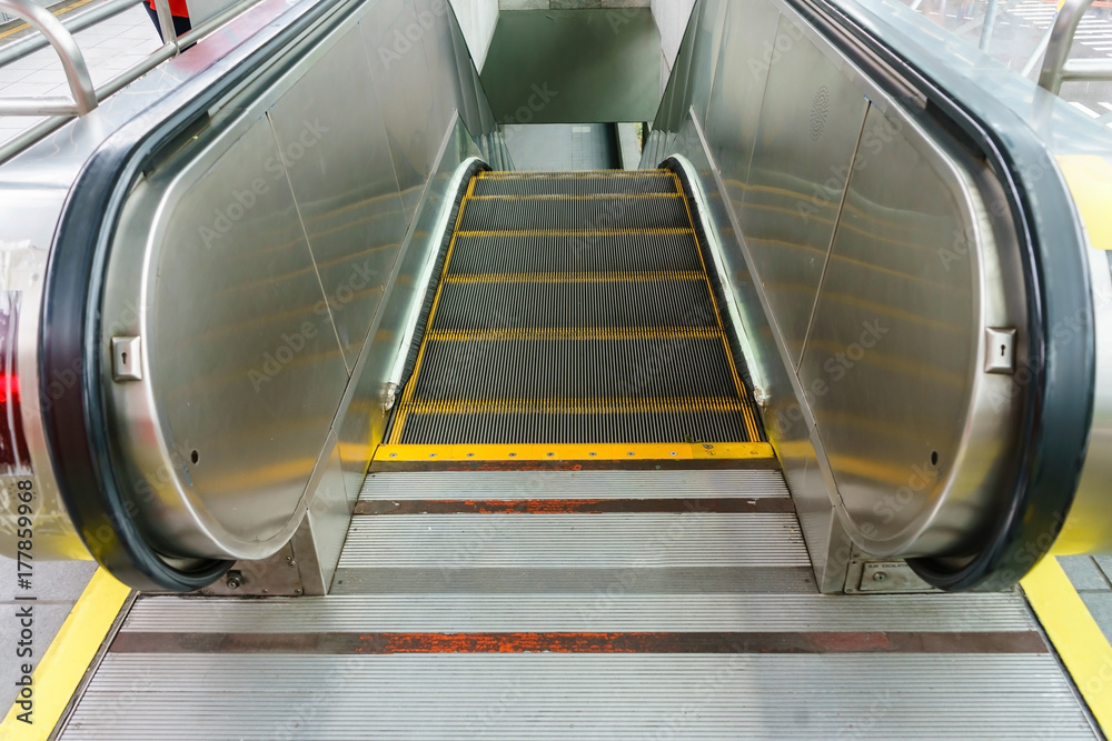 Escalator in metro. Moving up staircase. escalator. electric escalator ...