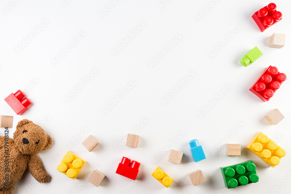 Kids toys background with teddy bear and colorful blocks Stock Photo ...