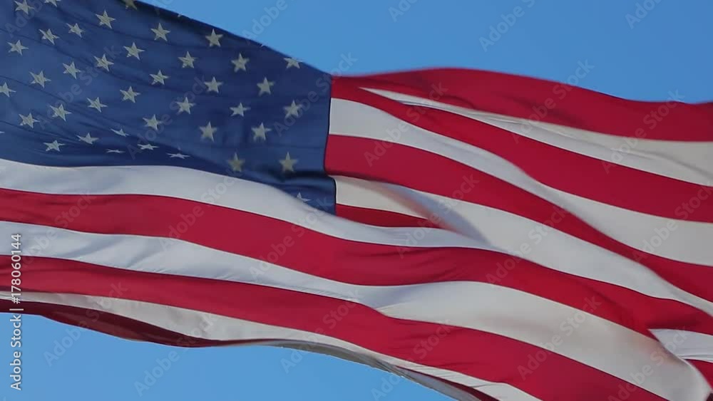 USA flag flaping in wind. Elegant Nylon American Flag Waving in the ...