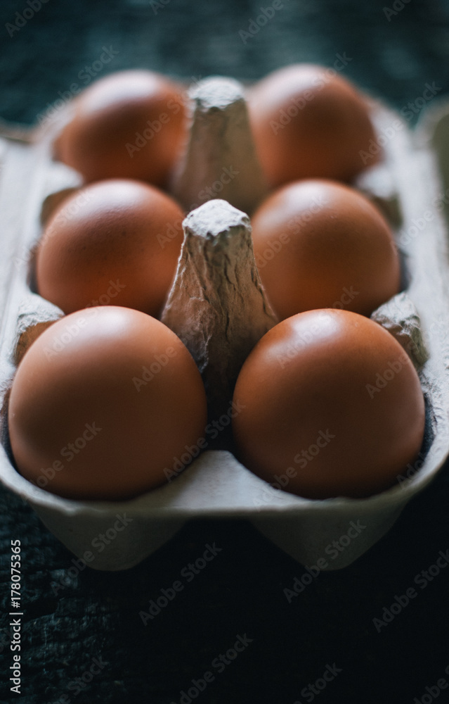Six Eggs in Carton Stock Photo | Adobe Stock