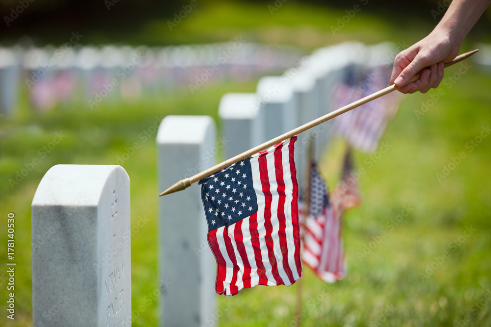 Memorial: Boy Placing American Flags By Headstones Stock Photo | Adobe ...